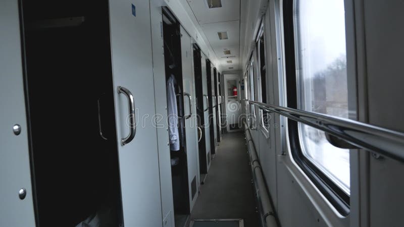 Corridor of a Moving Train. the Compartment Doors are Ajar in the ...