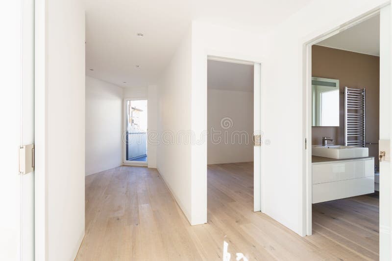 Corridor, open doors stock image. Image of space, floor - 22372683