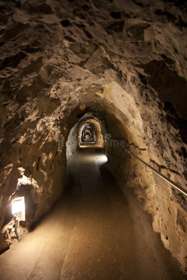 Corridor in rock stock image. Image of rock, tube, escape - 25886519
