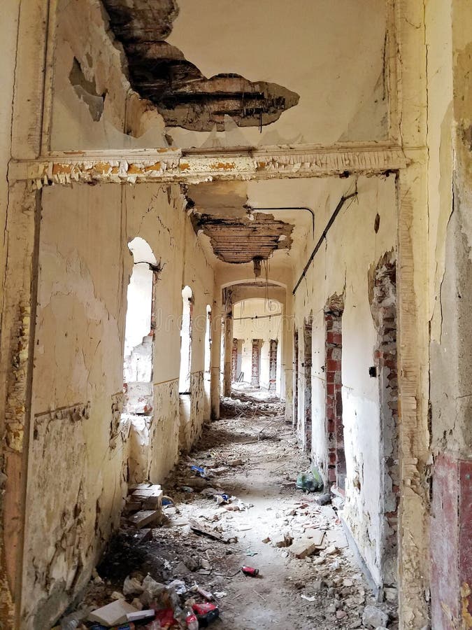 Corridor in a Ruined Building Stock Photo - Image of dilapidate ...