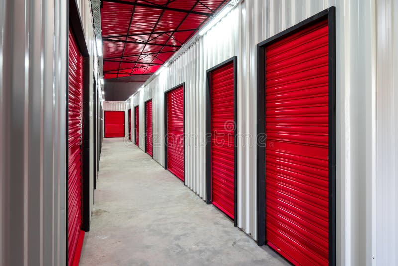 Corridor of Self Storage Unit with Red Doors. Rental Storage Units ...
