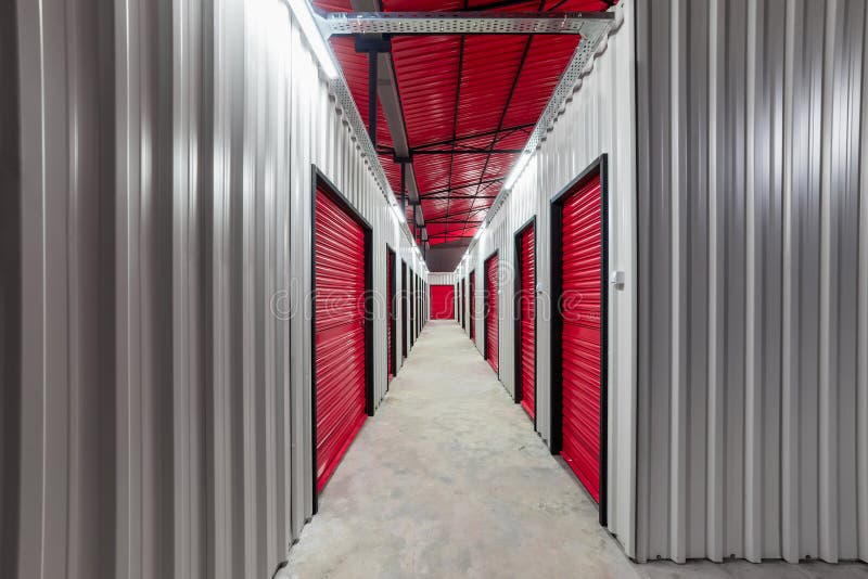 Corridor of Self Storage Unit with Red Doors. Rental Storage Units ...