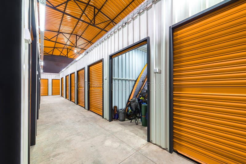 Storage Building with Red Doors Stock Image - Image of estate, delivery ...
