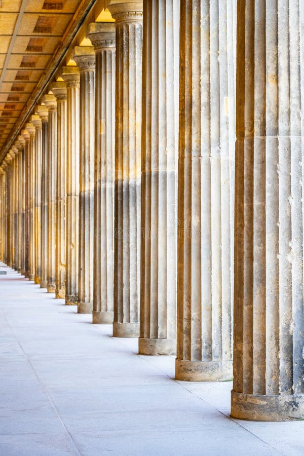 Sunlit Ancient Columns in Perspective Stock Image - Image of elegant ...