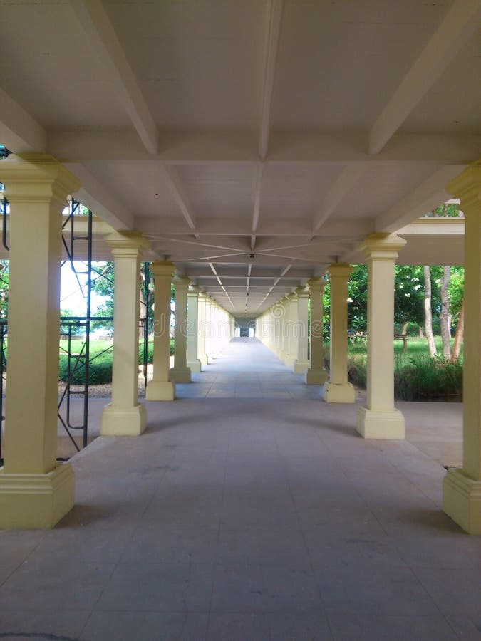 Corridor Under the Building Stock Image - Image of floor, building ...