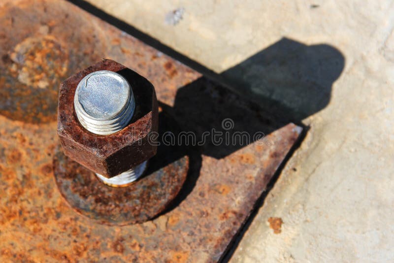 Rusted bolt on sand stock image. Image of steel, corroded - 132453197