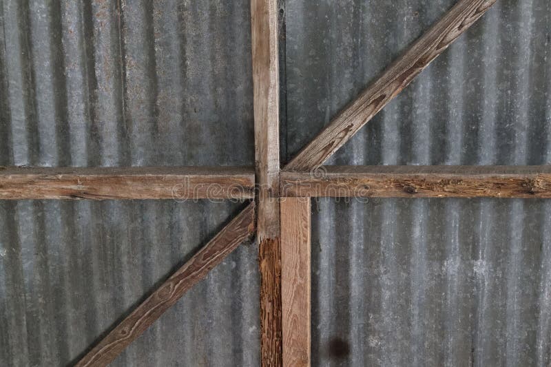 Corrugated Metal and Rustic Wood Cross Bars Stock Photo - Image of ...