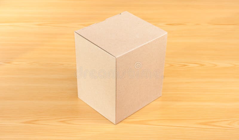 Corrugated Paper Box on Wood Table Stock Photo - Image of desk, case ...