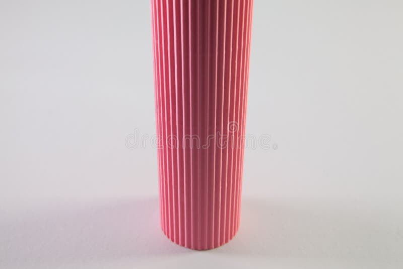 Corrugated Pink Paper Roll on the White Desk. Stock Image - Image of ...