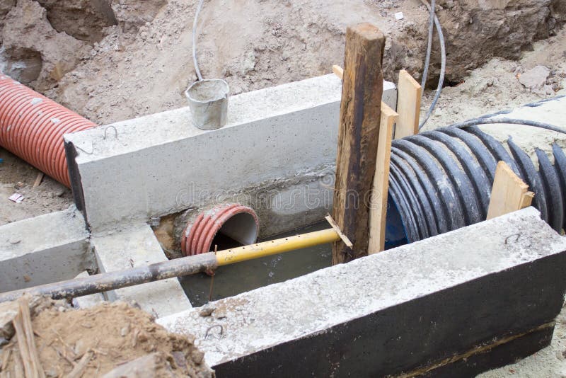 Corrugated Pipe in Concrete in Road Construction Stock Photo - Image of ...