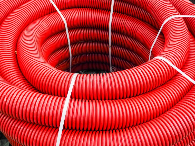 Corrugated Pipe, Drainage. in the Roll, Close-up. the Tube is ...