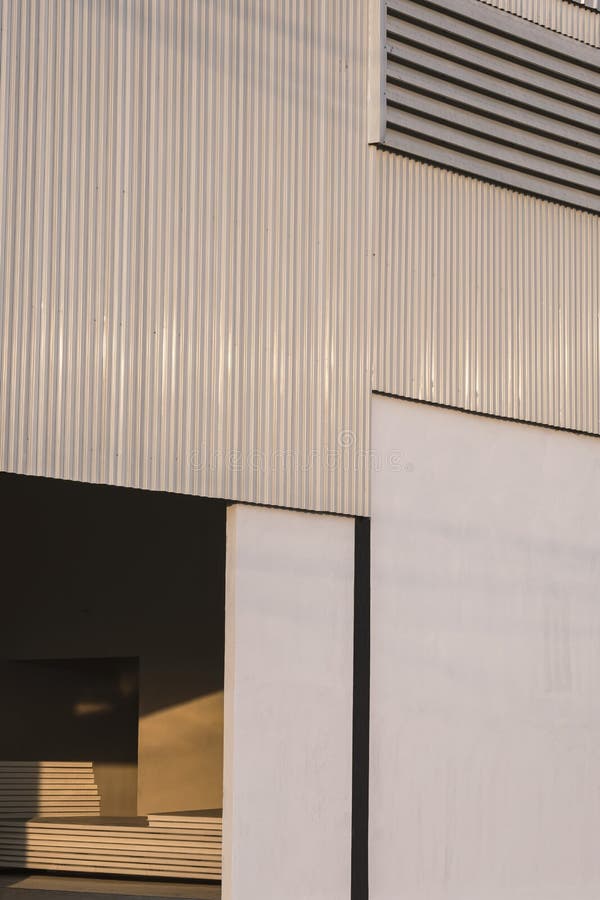 Corrugated Steel Wall with Stack of Many Sandwich Panels Inside of Door ...