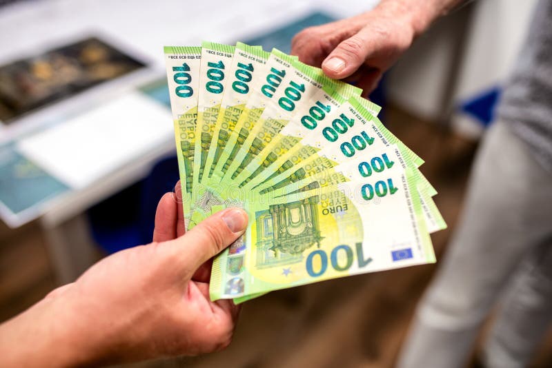 Corruption Concept. Giving a Bribe Stock Photo - Image of euros ...