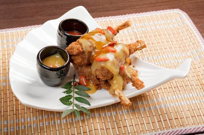 Cosce di rane fritte immagine stock. Immagine di gusto - 21516045