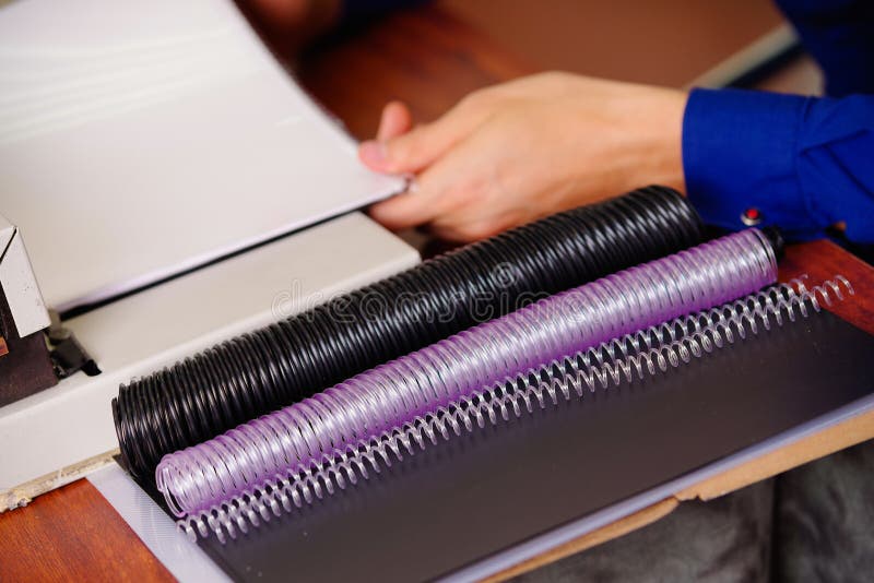 Cose Up of Plastic Ring of Different Sizes and Colors Used for Binding ...