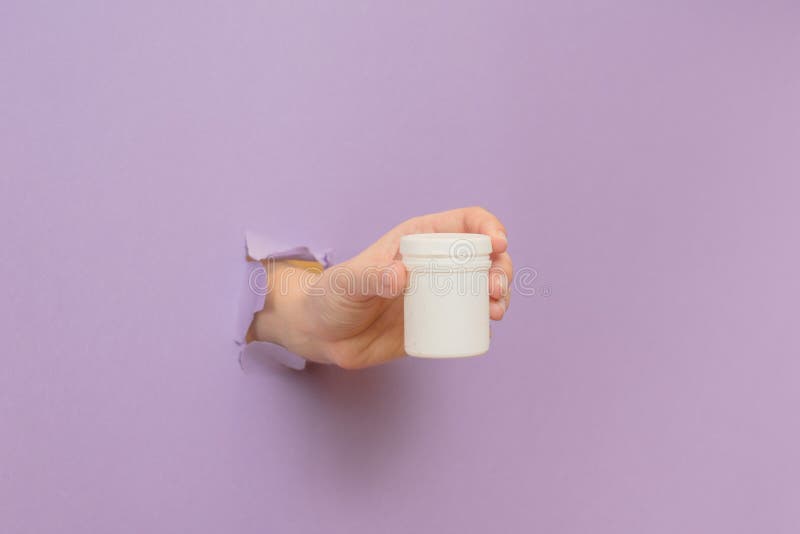 Cosmetic Container in Female Hand. Cosmetic Beauty Packaging Stock ...