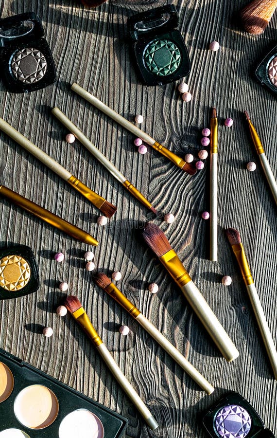 Cosmetic Set with Eye Shadow on Rustic Table Background Top View Stock ...