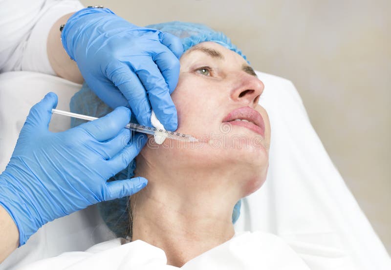 Cosmetic Treatment with Injection Stock Photo - Image of silicone ...
