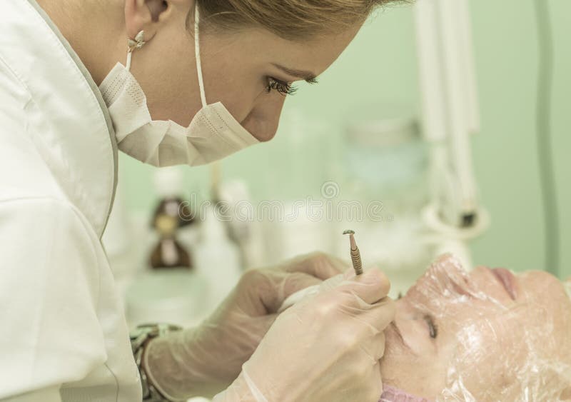 The Cosmetician in a Beauty Salon Stock Photo - Image of health ...