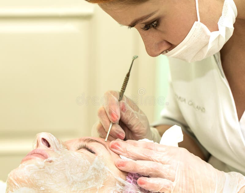 The Cosmetician in a Beauty Salon Stock Image - Image of tweezers ...