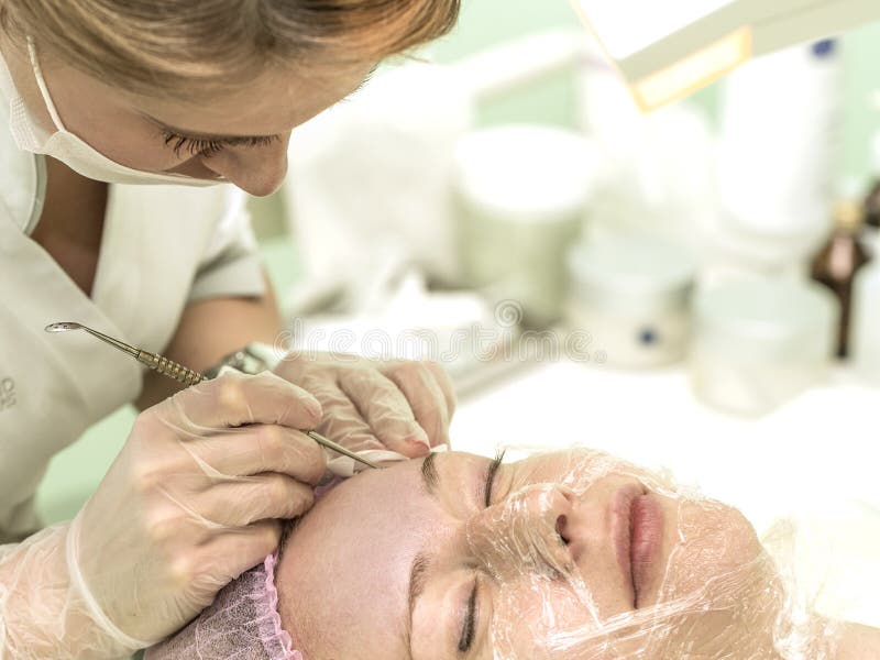 The Cosmetician in a Beauty Salon Stock Photo - Image of people ...