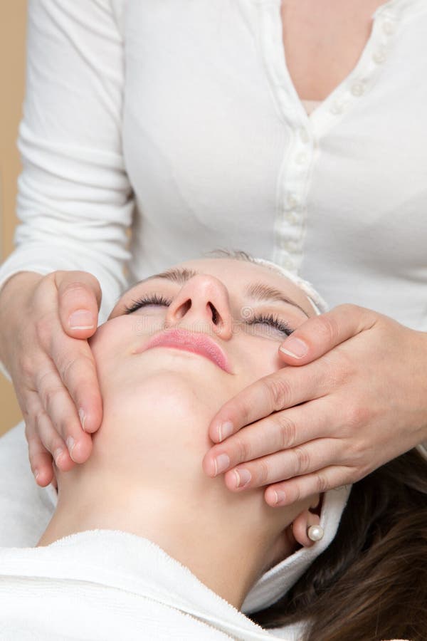 Cosmetician Giving Customer Face Massage Stock Photo - Image of cream ...