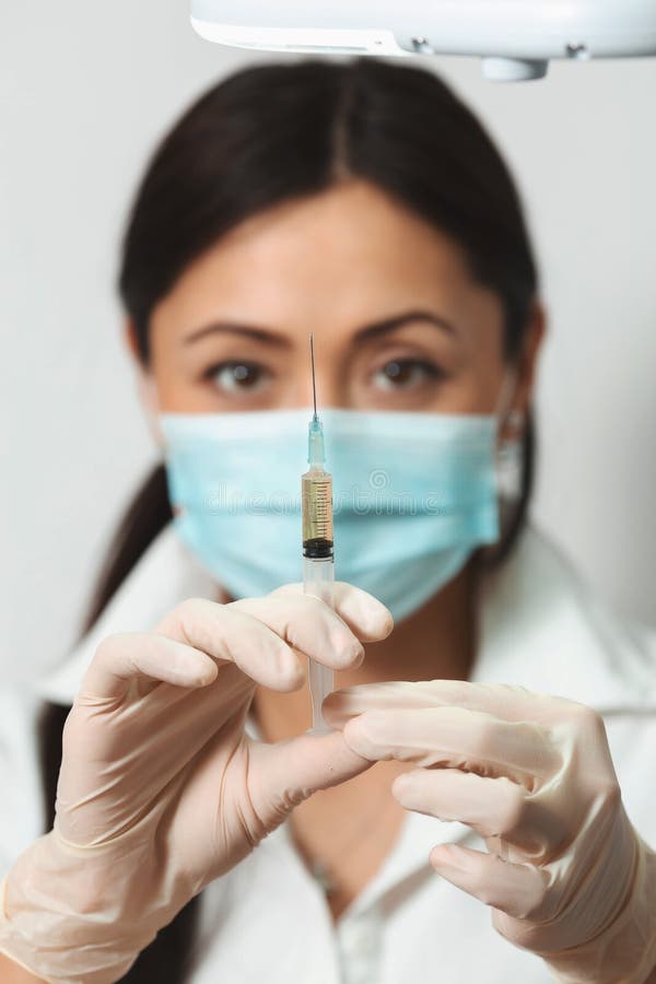 The Cosmetician Holds a Syringe with a Preparation Stock Image - Image ...