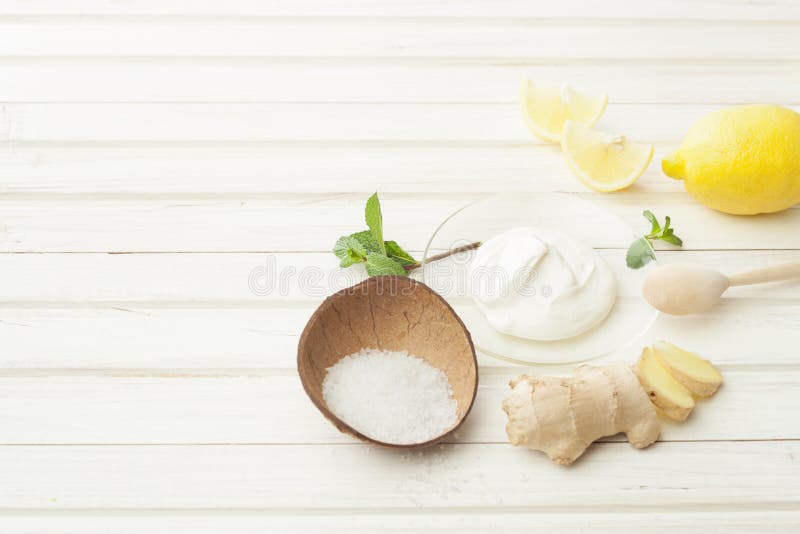 Cosmetics Homemade Lemon, Ginger, Salt and Essential Oils on Wh Stock ...