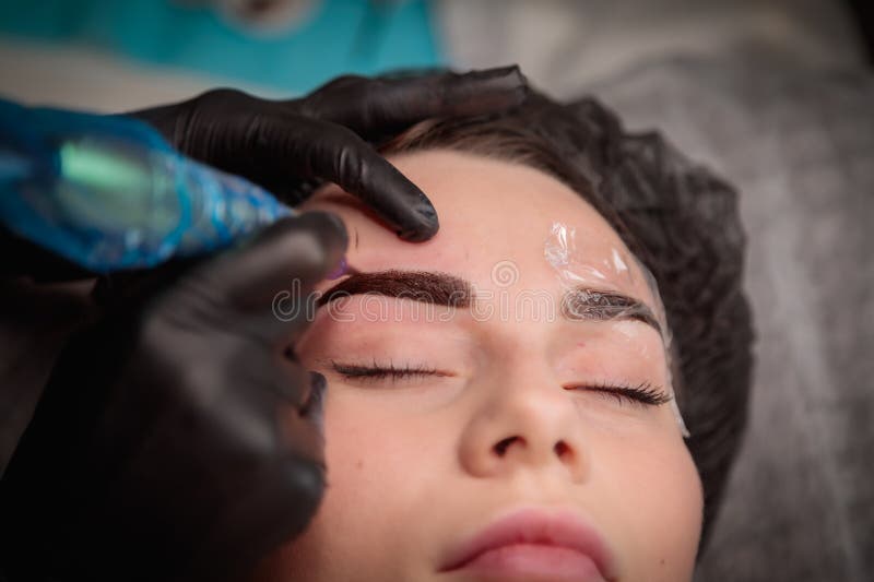 Portrait of Young Woman Showing Perfect Eyebrows after Permanent Makeup Treatment Stock Photo ...