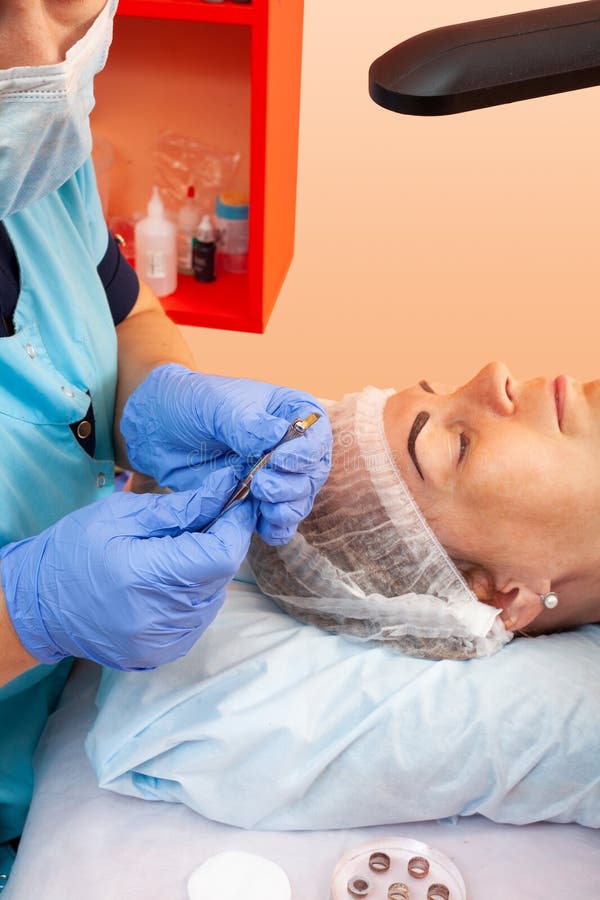Eyebrow microblading stock photo. Image of correction - 305137158