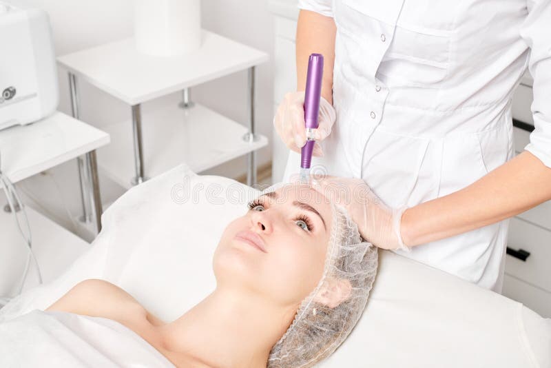 Cosmetologist Makes Mesotherapy Injection For Rejuvenation Woman Face