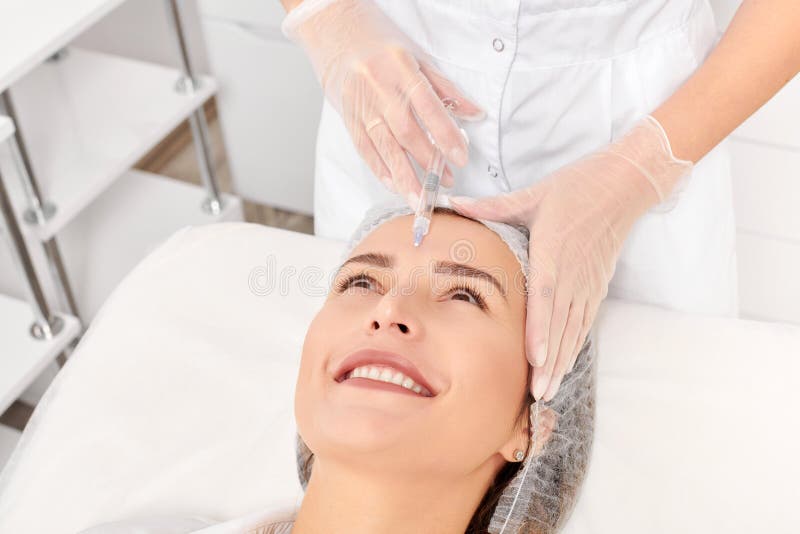 Cosmetologist Makes Rejuvenation Injection In Woman Face Anti Aging