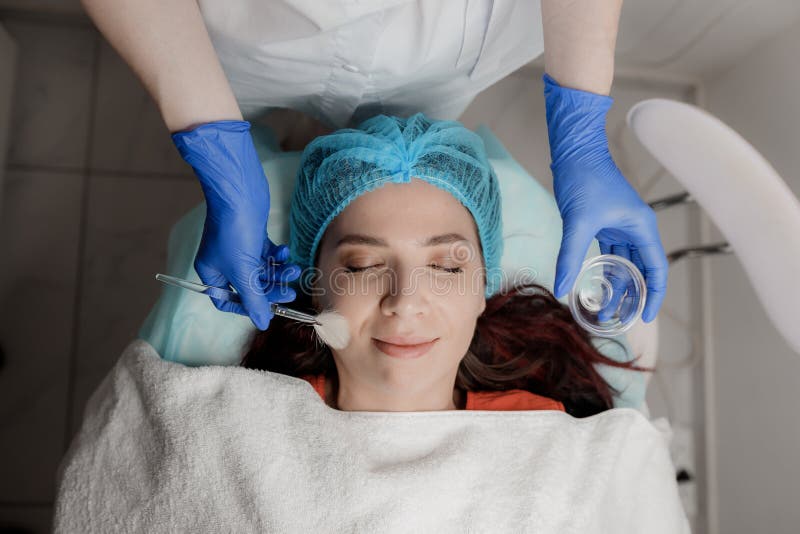 A Cosmetologist Performs Cosmetic Procedures for Skin Care Stock Image ...