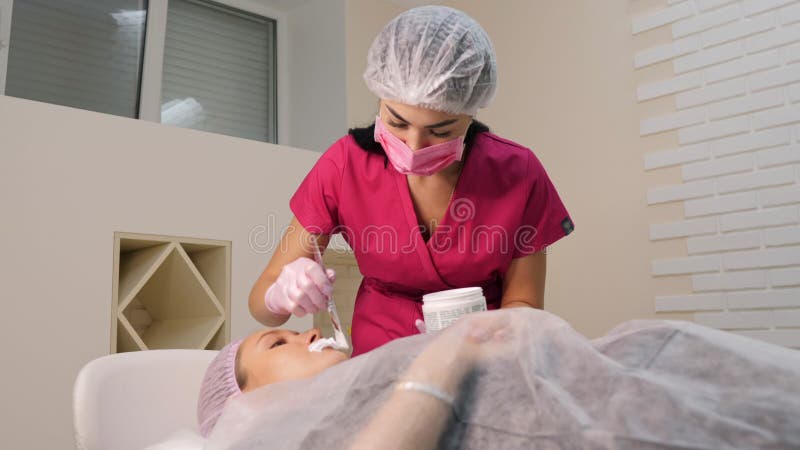 Cosmetology. Anesthesia on the Lips for Permanent Lip Makeup or Lip ...
