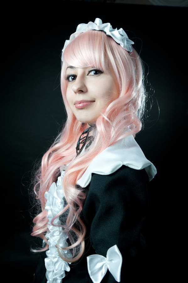 Cosplay Girl Blue Hair Costume and Paw. Intense Eyes Stock Image ...