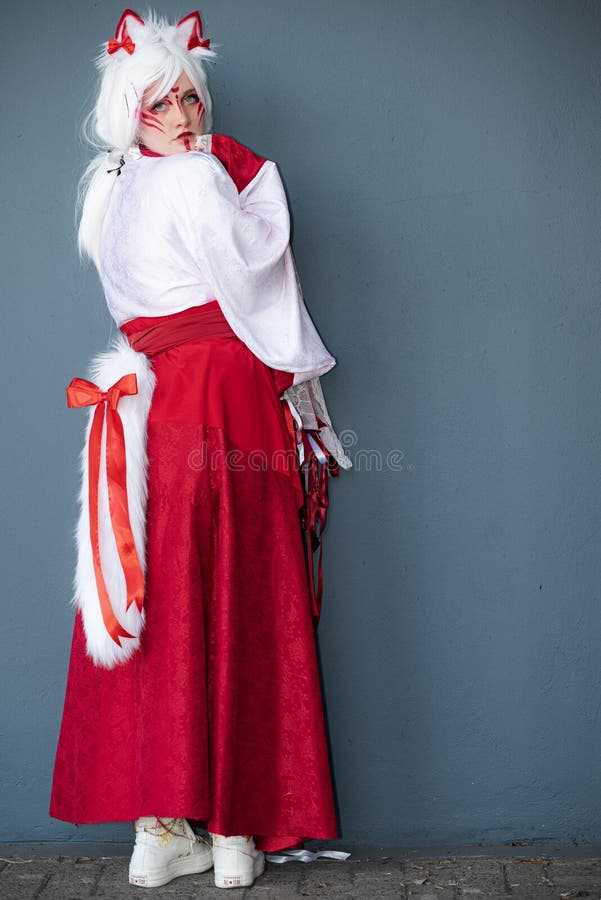 Cosplayer Dressed in a Japanese White and Red Cat Priestess Costume ...