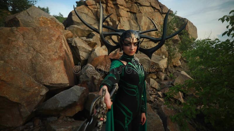 Cosplayer Portrays Death Goddess Hela with Sword Stock Footage - Video ...
