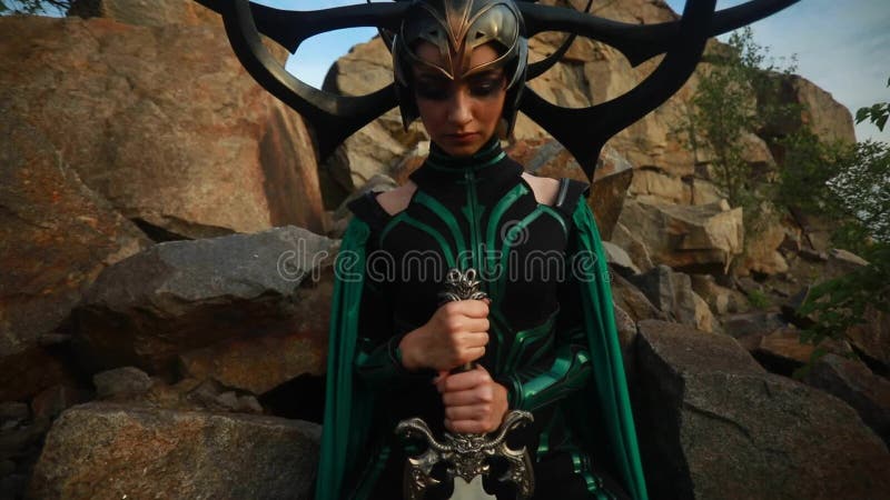 Cosplayer Portrays Death Goddess Hela with Sword Stock Footage - Video ...