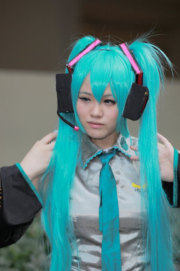 The Cosplayers Posing at the Fair Editorial Photo - Image of lifestyle ...