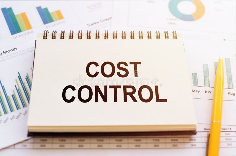COST CONTROL - Written on Notepad on Financial Charts and Graphs with ...