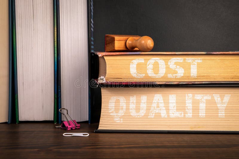 Cost and Quality. a Stack of Books on a Wooden Shelf Stock Photo ...