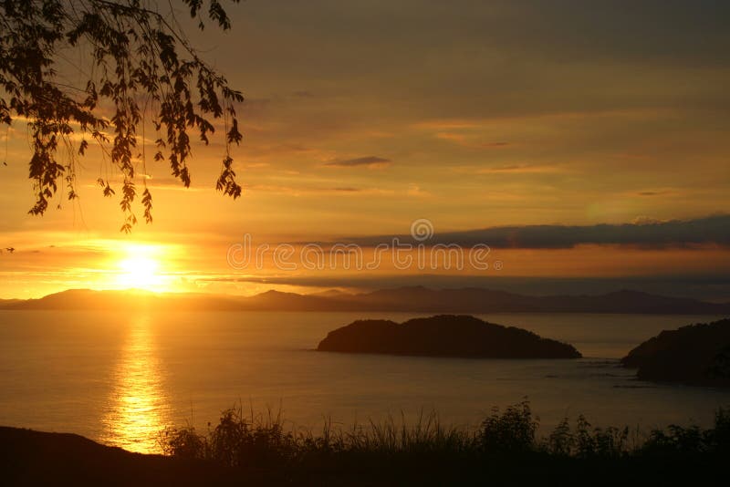 Costa Rican Sunset stock image. Image of orange, ocean - 621585