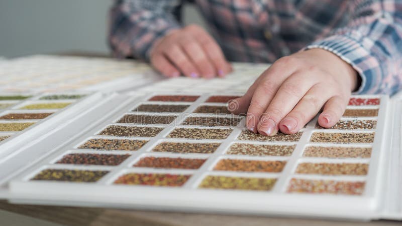 Costumer Chooses Building Materials in Image from Catalog Stock Photo ...