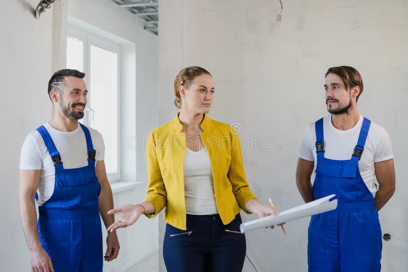 Costumer Talking with Builders about a Renovation Stock Photo - Image ...