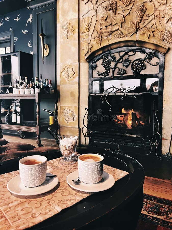 Cosy Atmosphere. Two Cups of Coffee on the Table in Front of the ...