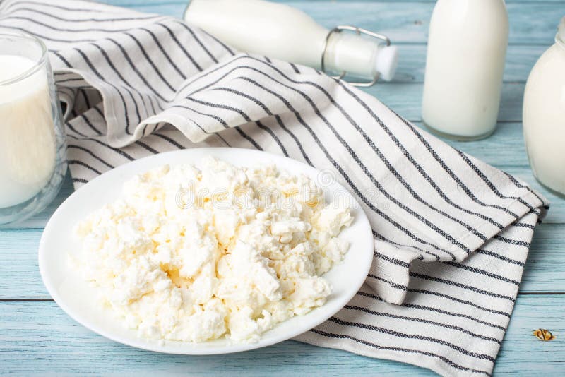 Cottage Cheese on a Blue Table Stock Image - Image of cheese, fresh ...