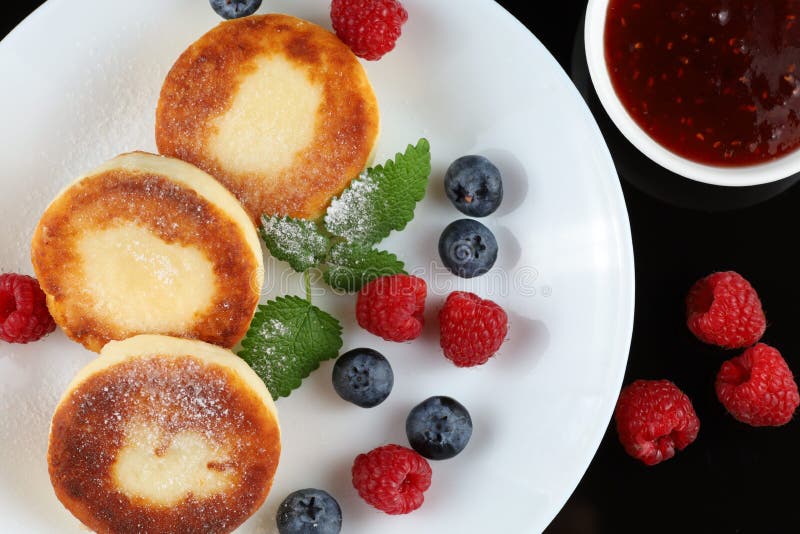 Cottage Cheese Fritters Served with Fruit Jam Stock Photo - Image of ...