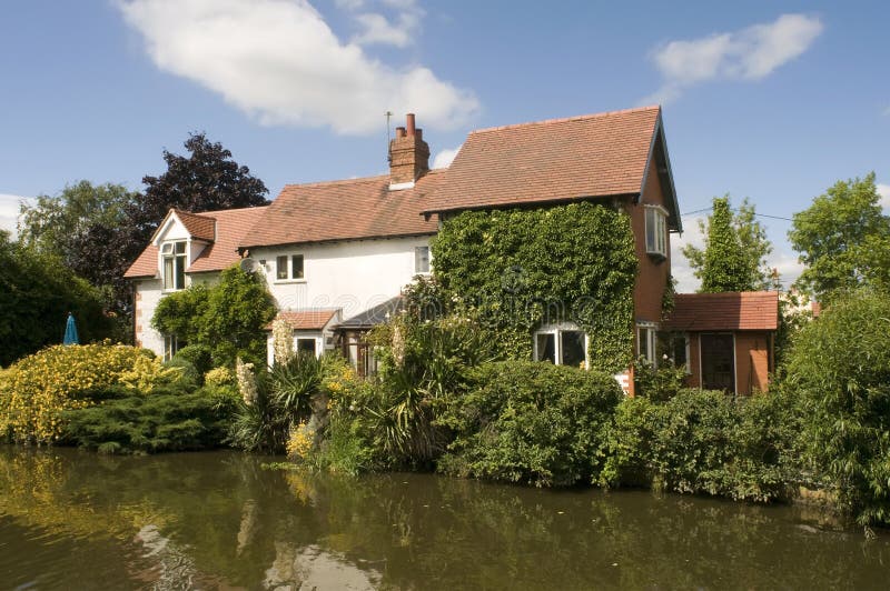 Cottage House Alongside Canal Stock Image - Image of real, pretty: 5793085