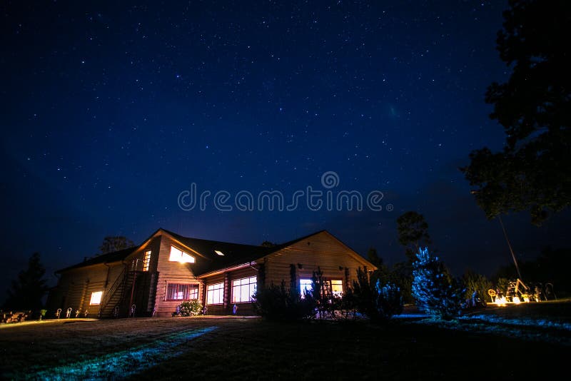 Cottage house at night stock photo. Image of celebration - 79245318