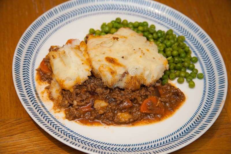 Cottage Pie with Peas on a Plate Stock Image - Image of delicious ...